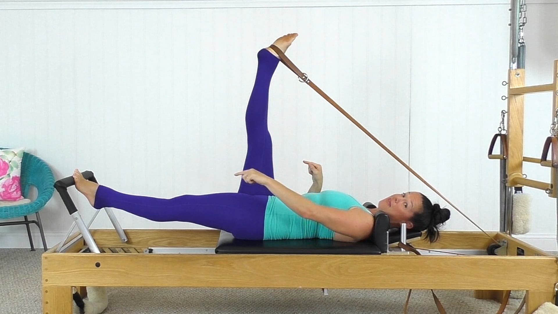 Stretching With The Feet In The Straps Tutorial - Carrie Pages Pilates